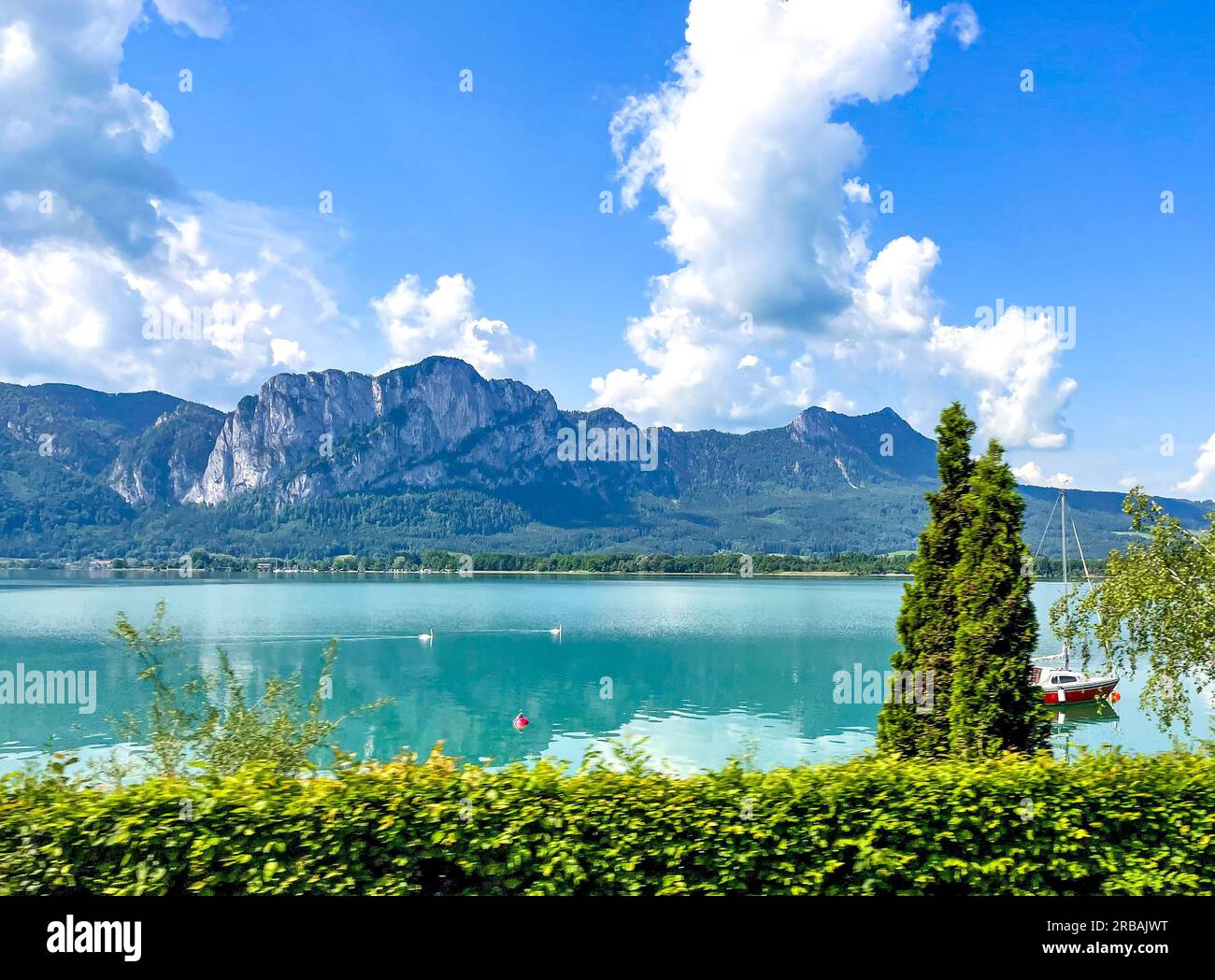 Mondsee, Upper Austria – AT – June 7, 2023 Horizontal view of peaceful ...