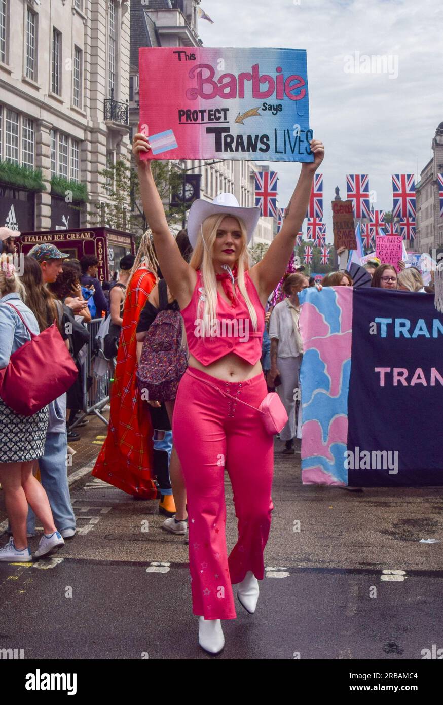 London, UK. 8th July 2023. A protester wears a Barbie costume as ...