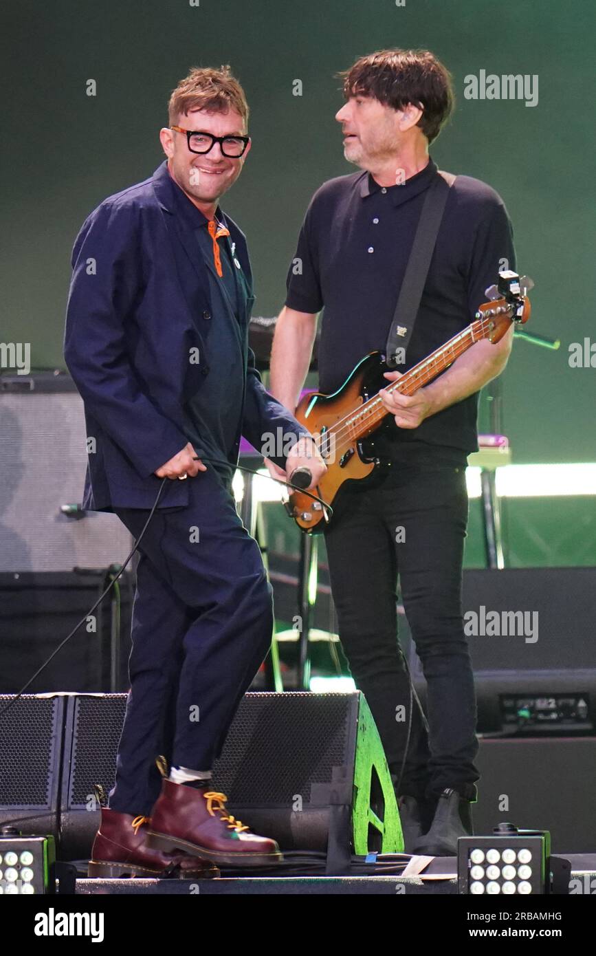Damon Albarn and Alex James of Blur performing on stage at Wembley ...