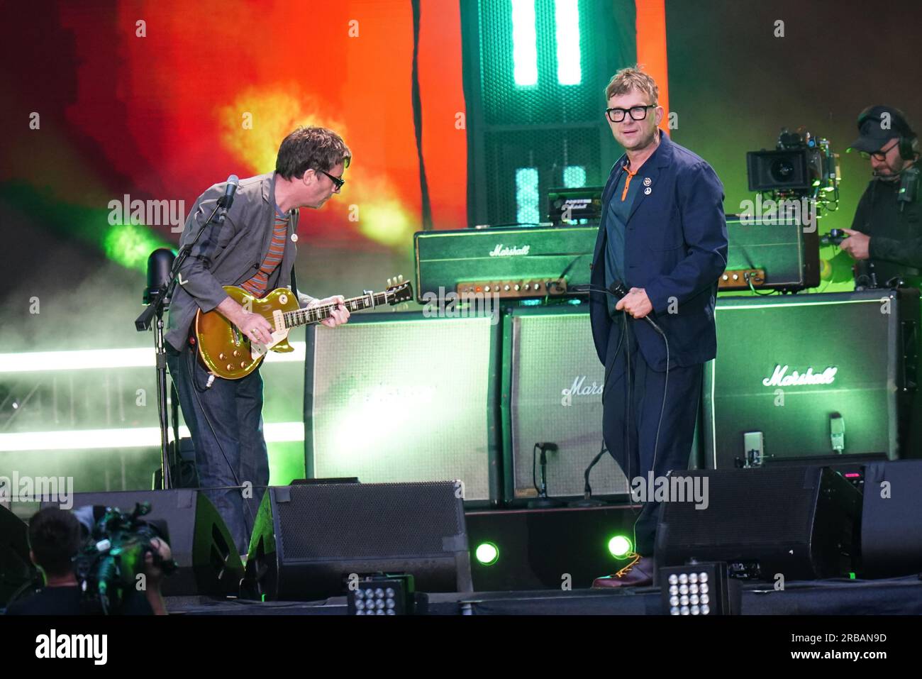 Graham Coxon and Damon Albarn of Blur performing on stage at Wembley ...