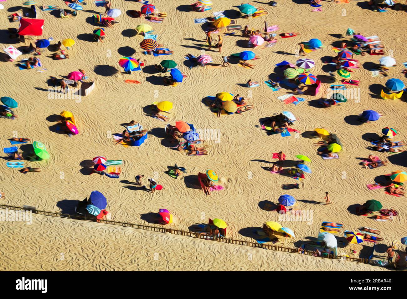 View from above of anonymous crowd, holidaymakers, colourful parasols ...
