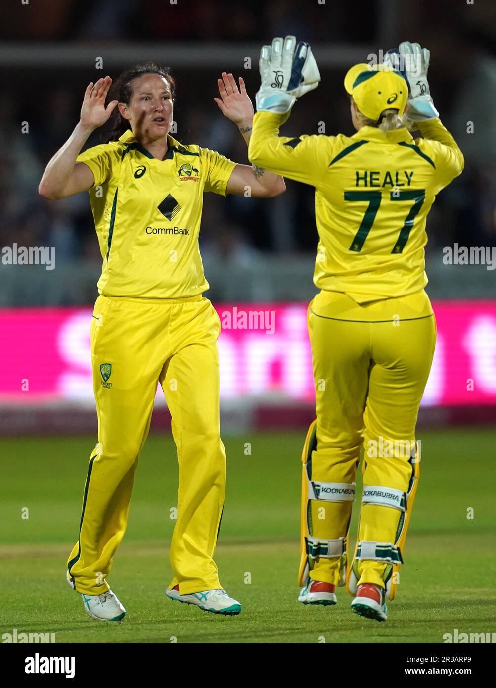 Australia's Megan Schutt and Alyssa Healy celebrate the wicket of ...
