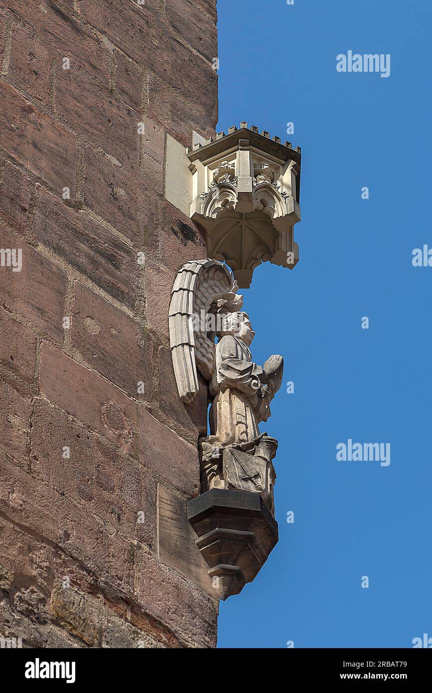 Nassau House, historic residential tower with sundial and angel ...