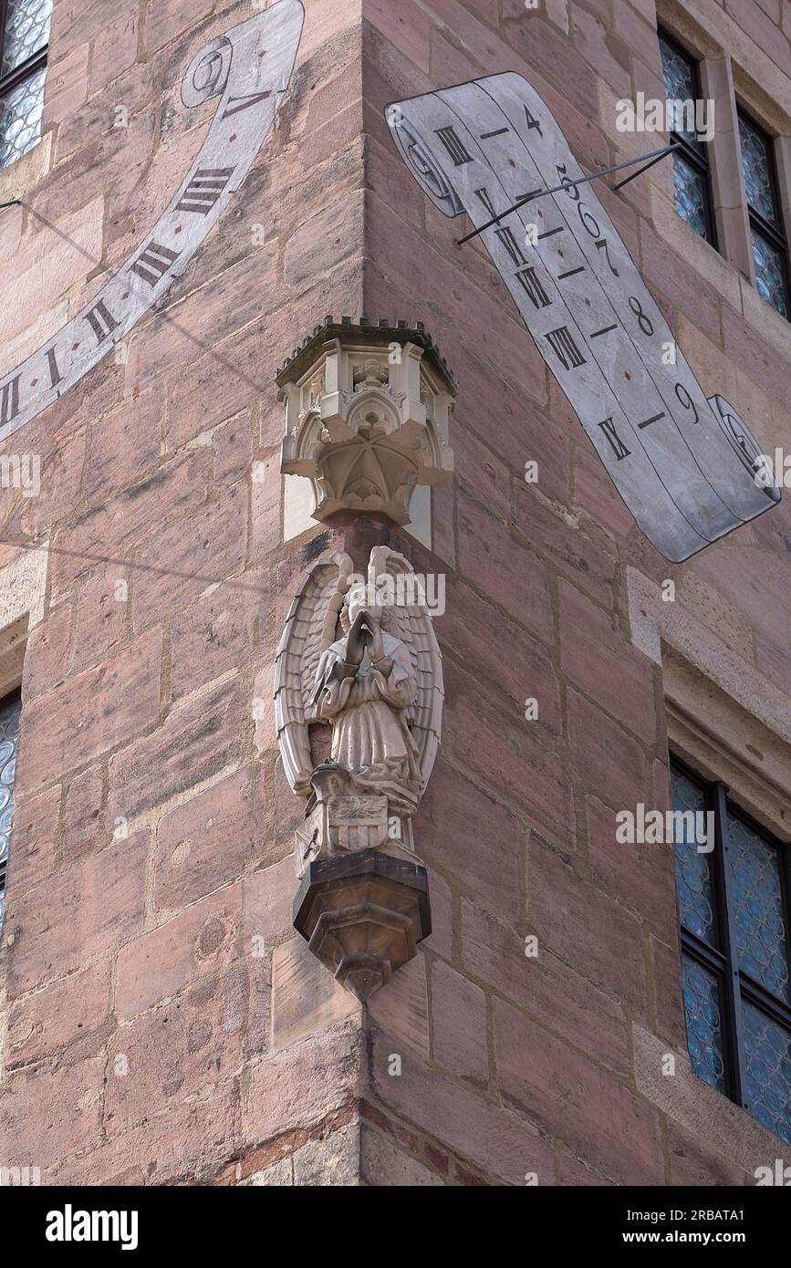 Nassauer Haus, historic residential tower with sundial and angel ...
