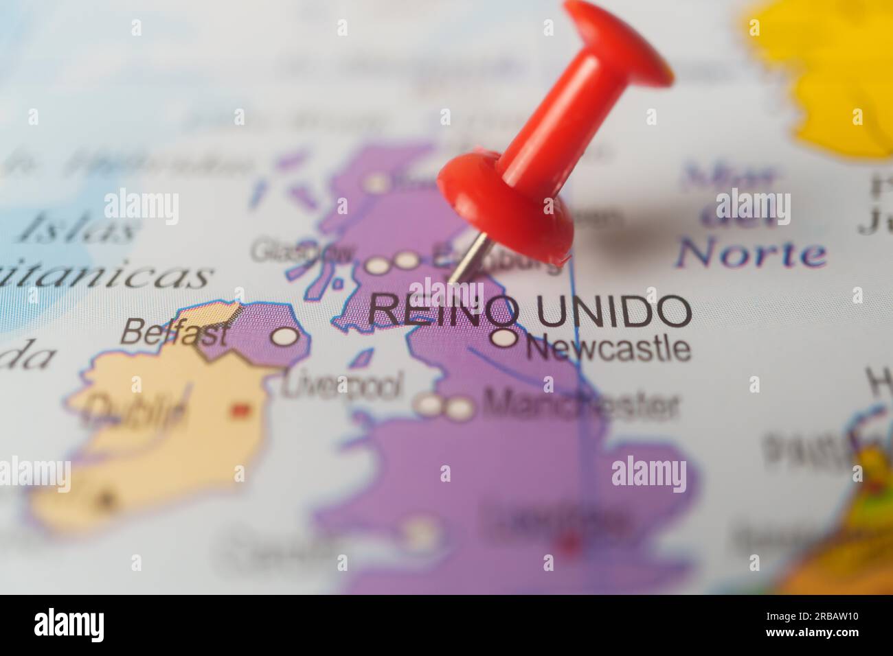 United kingdom marked with a red thumbtack on a map with an out-of ...