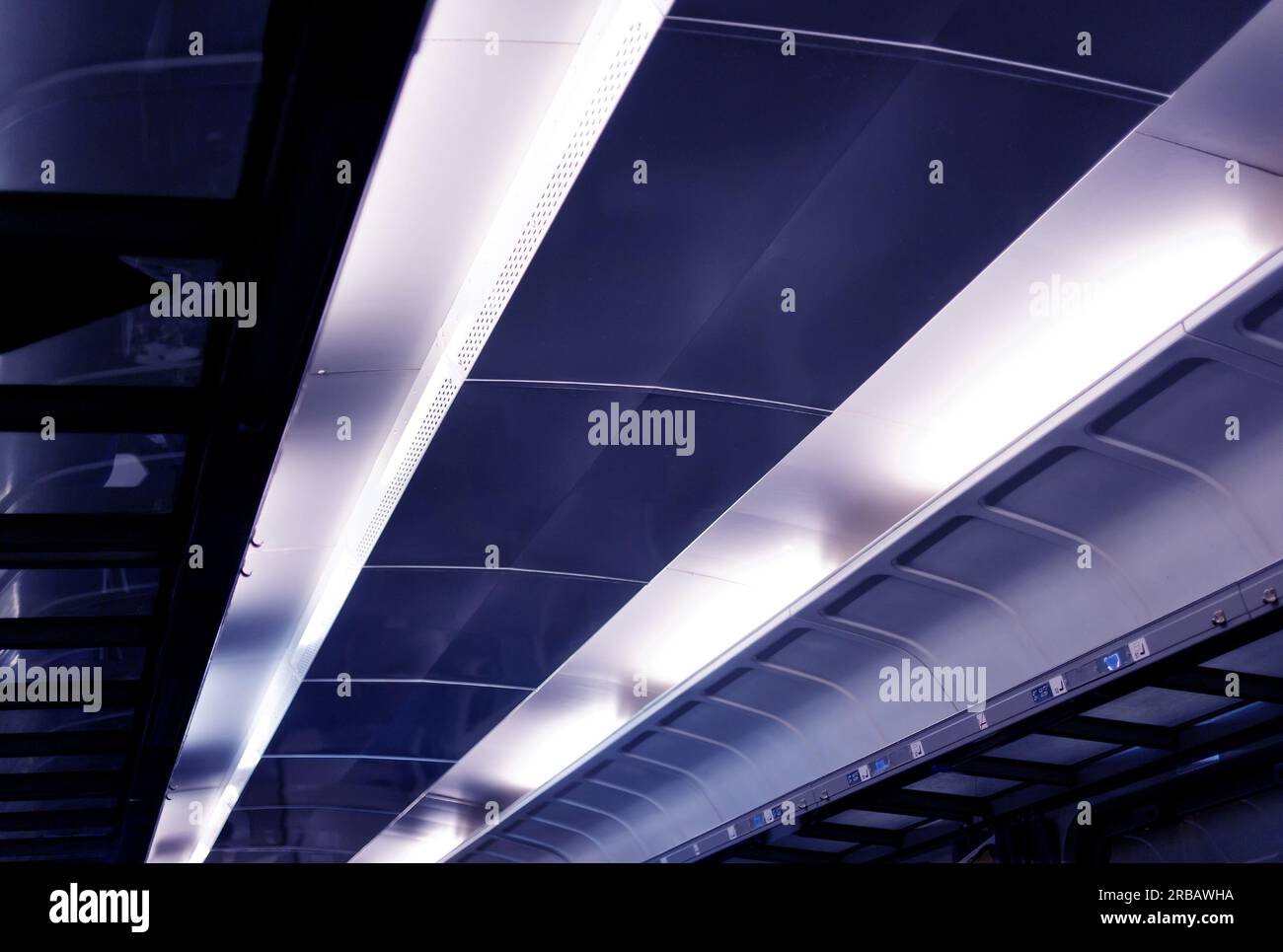 Blue interior of a modern luxury train with ceiling and lamps Stock ...