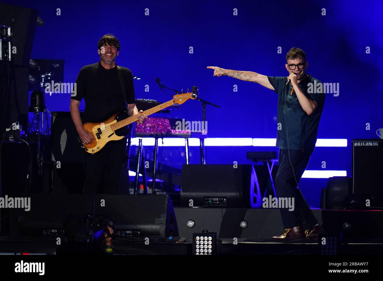 Alex James and Damon Albarn of Blur performing on stage at Wembley ...