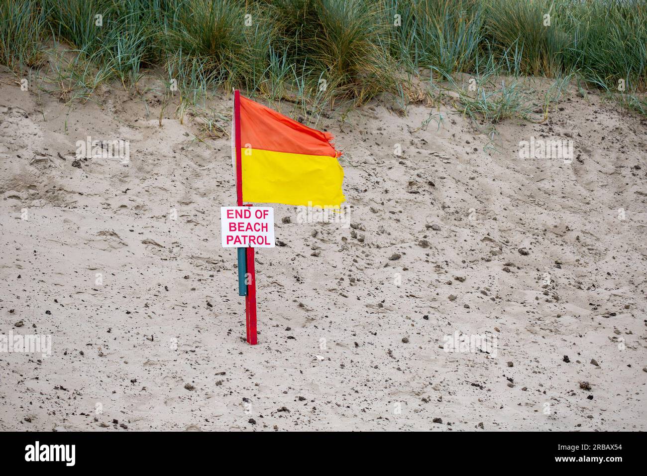 Yellow red flag beach hi-res stock photography and images - Alamy