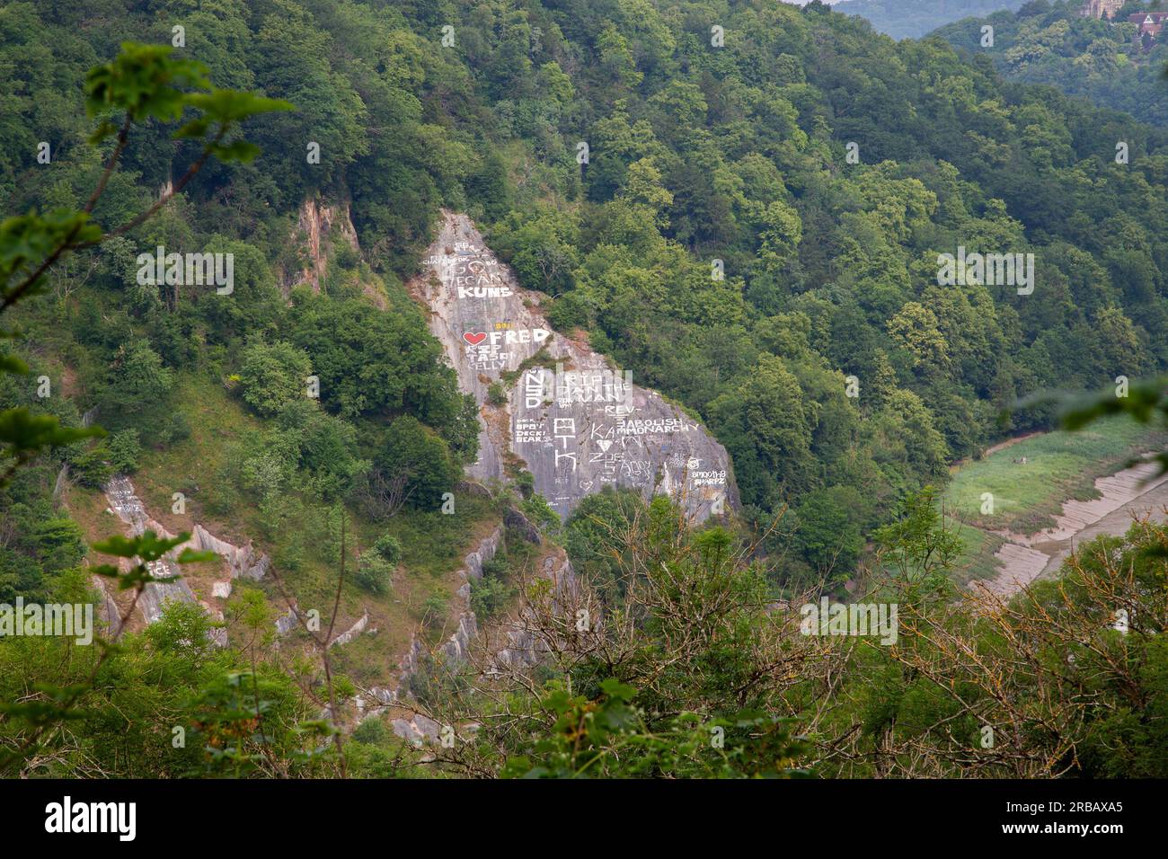 Bristol, England - June 17th 2023: Graffiti on cliff face of rocks in ...