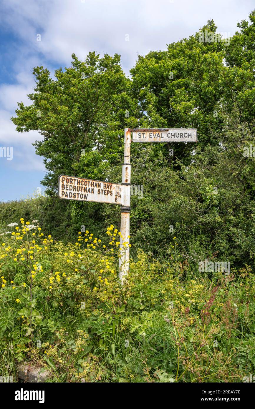 Old signposts with place names on a country road in North Cornwall ...