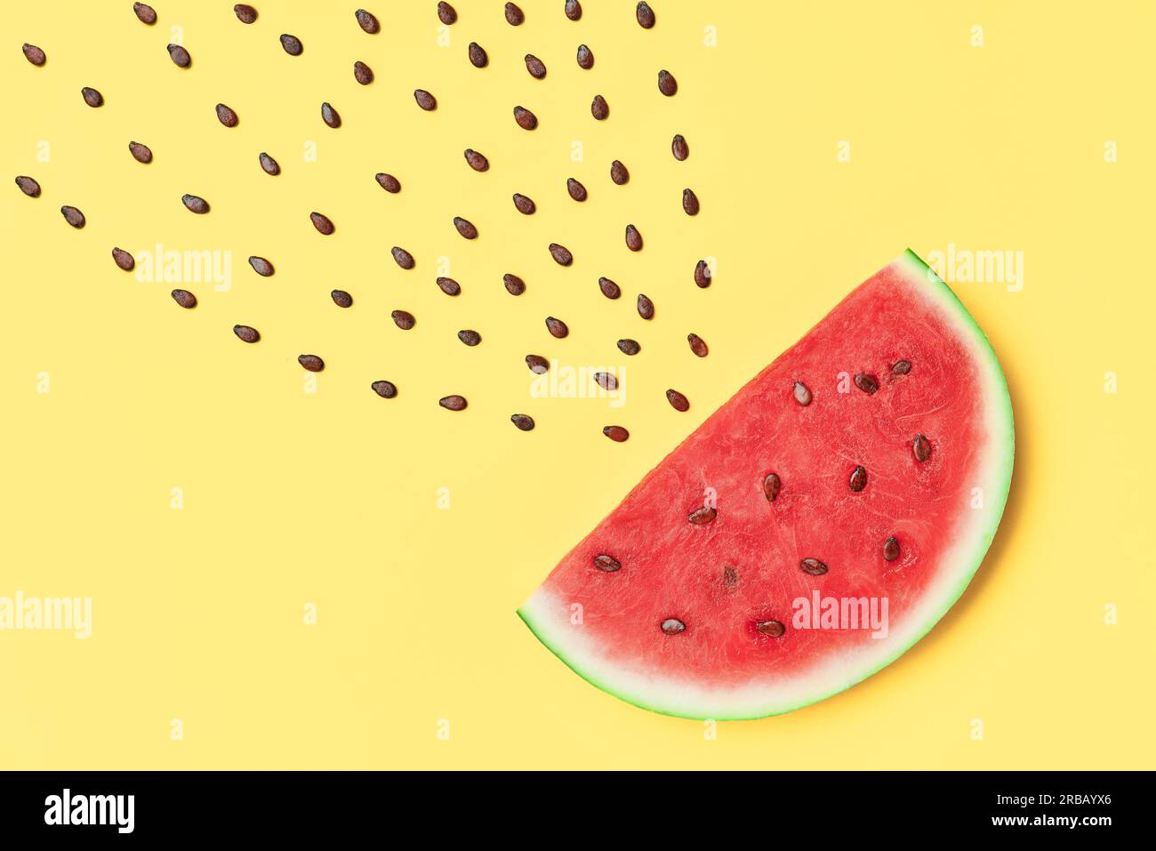 Watermelon slice with seeds on yellow background. Creative layout. food ...