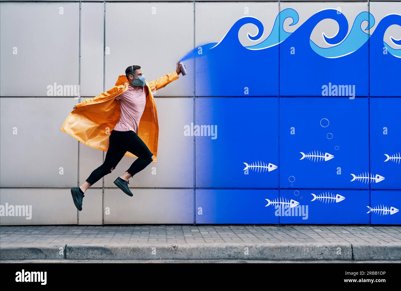 Street artist jumping to paint graffiti in underwater lifestyle. Urban ...