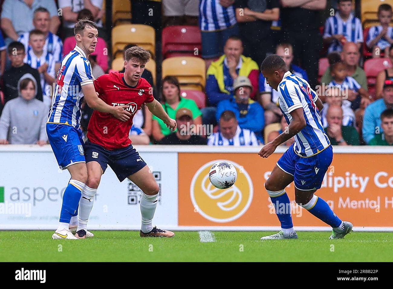 Ciaran Brennan #34 of Sheffield Wednesday and Luke Cook #16 gain ...