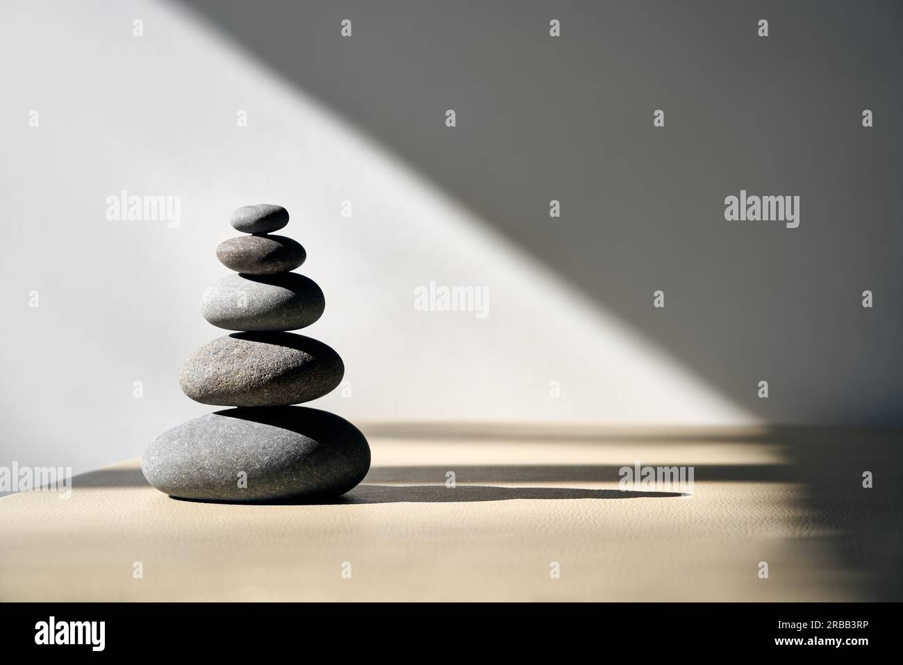 Pyramid of pebbles stones with copy space. Balance, harmony, minimalism ...