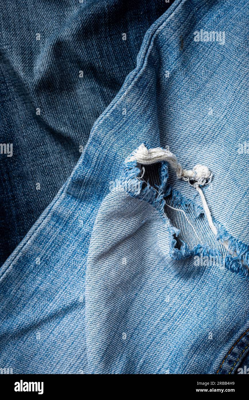 Detail of blue jeans texture with tear. Free room for copyspace Stock ...