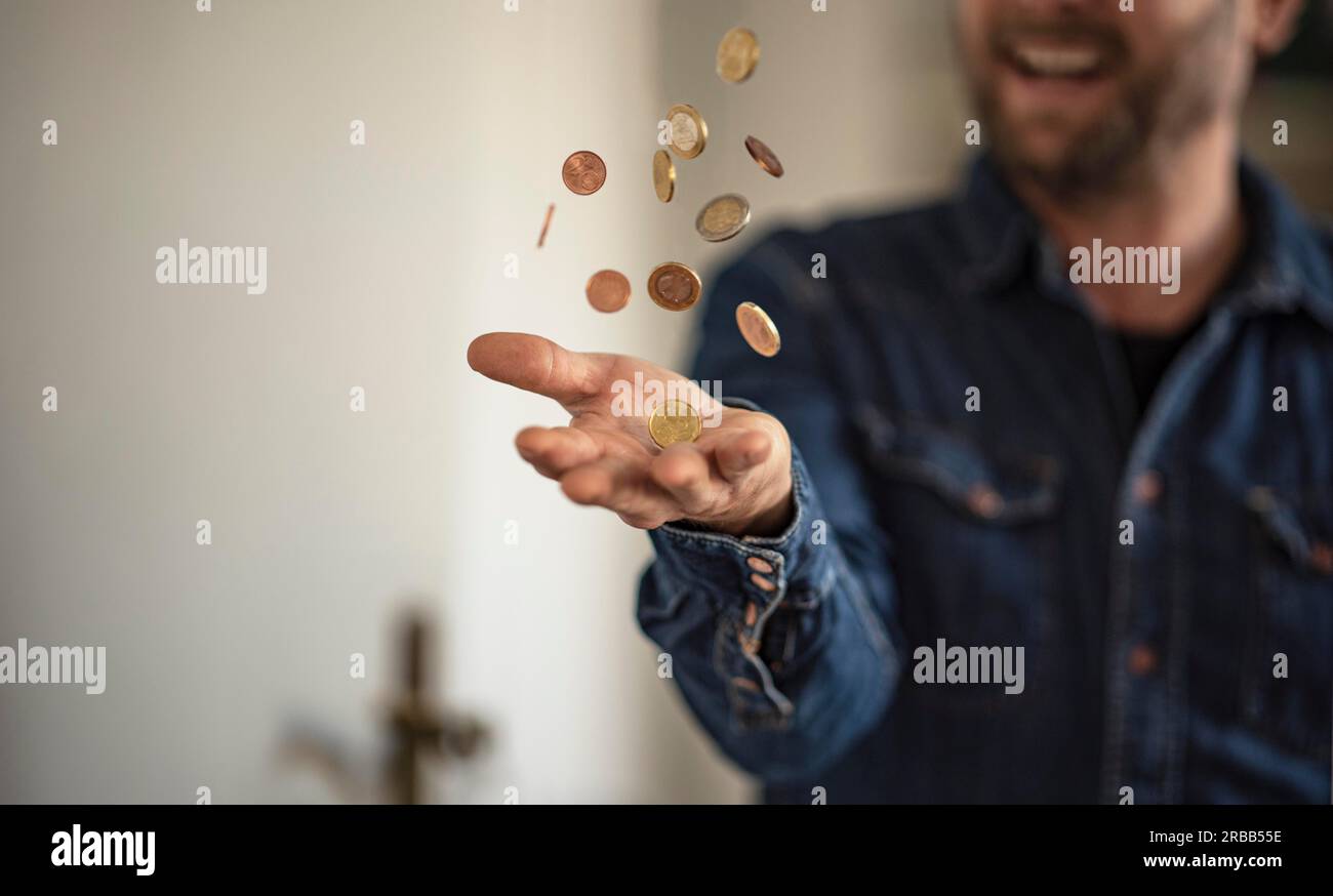 Coin throw hi-res stock photography and images - Alamy