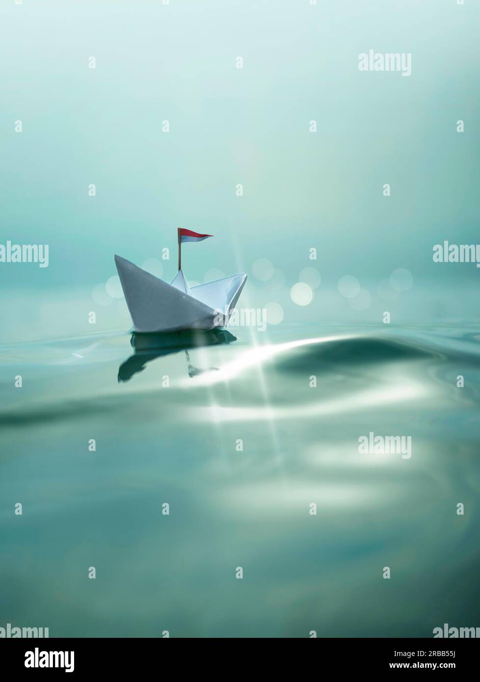 Sail away with paper boat Stock Photo - Alamy