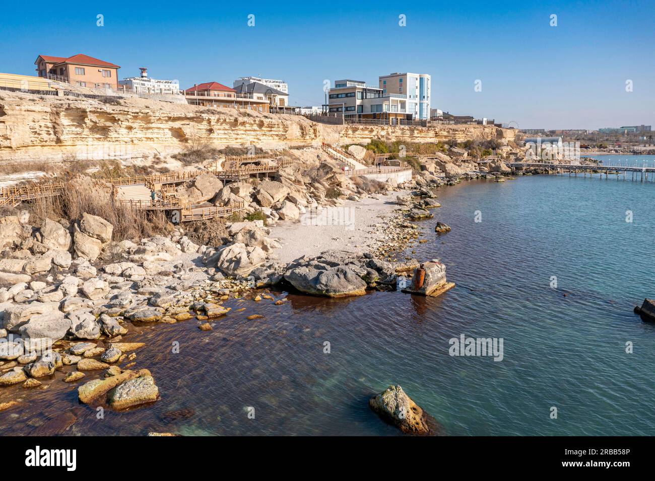 Aerial of the sandstone cliffs and promenade in Aktau, Caspian sea ...