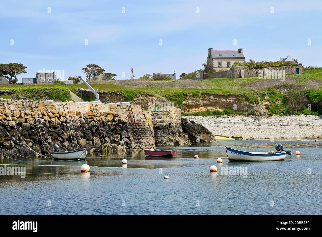 Boats on the quay wall, Lampaul, Ouessant Island, Finistere, Brittany ...