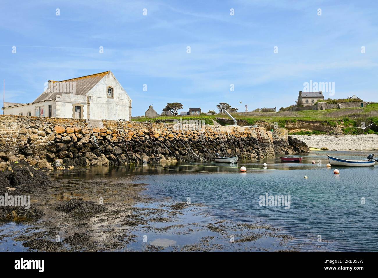 Boats on the quay wall, Lampaul, Ouessant Island, Finistere, Brittany ...