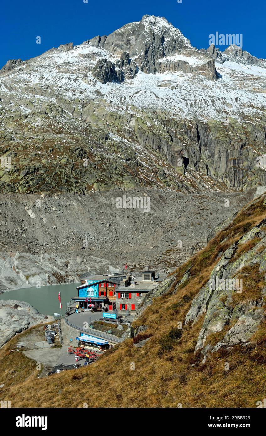 At the entrance to the ice grotto in the Rhone glacier, in the ...