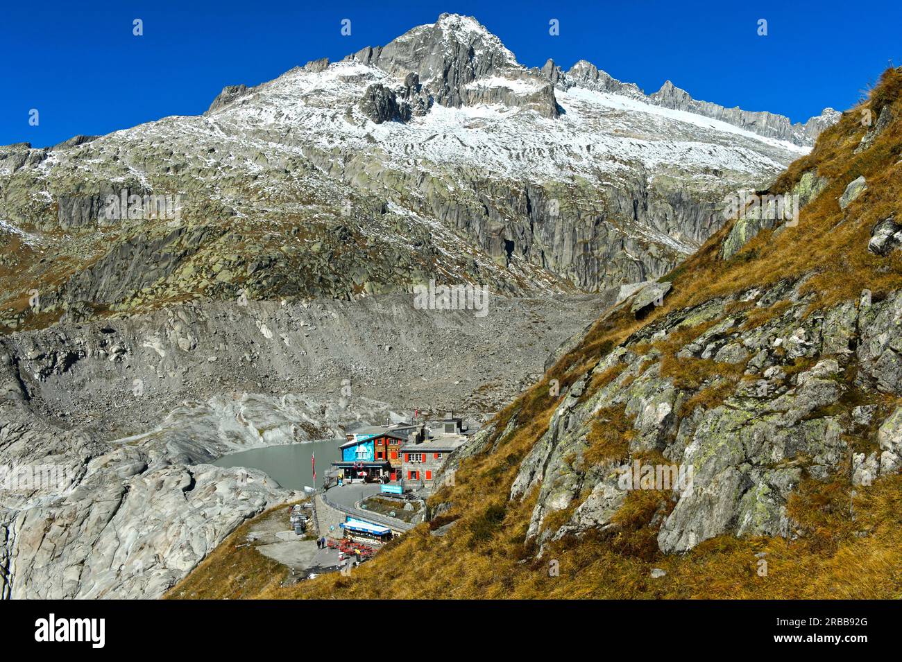 At the entrance to the ice grotto in the Rhone glacier, in the ...