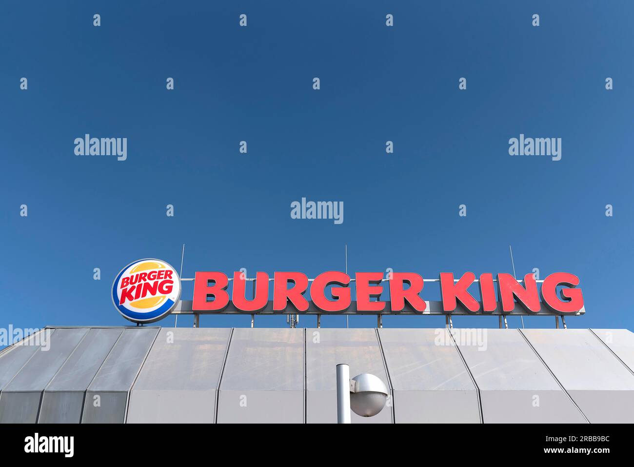 Burger King company logo, blue sky, Baden-Wuerttemberg, Germany Stock ...