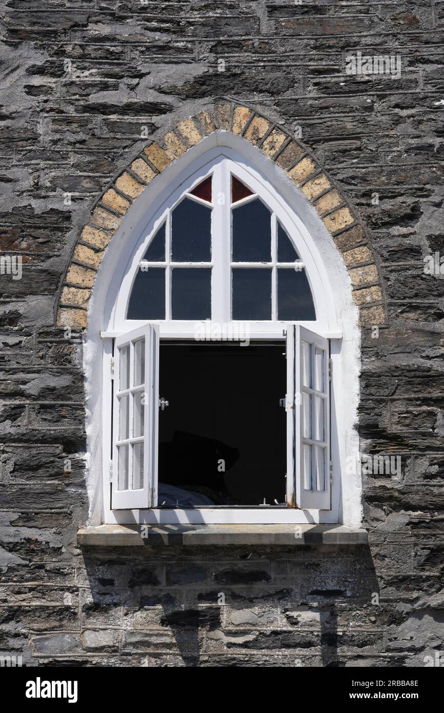 Gothic style windows on the former schoolhouse in Port Isaac, North ...