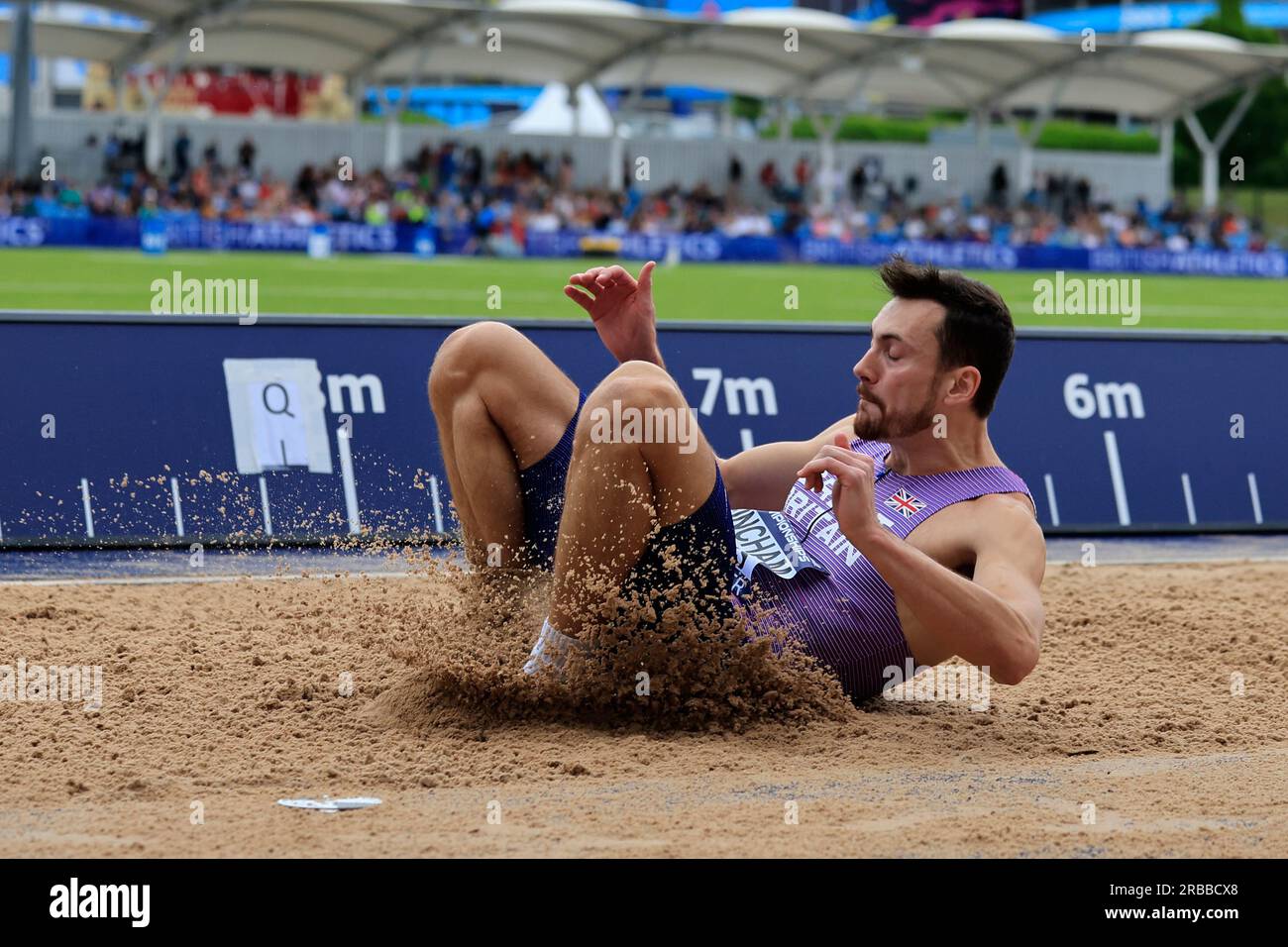 Jacob Fincham-Dukes on his way to winning the men’s long jump during ...