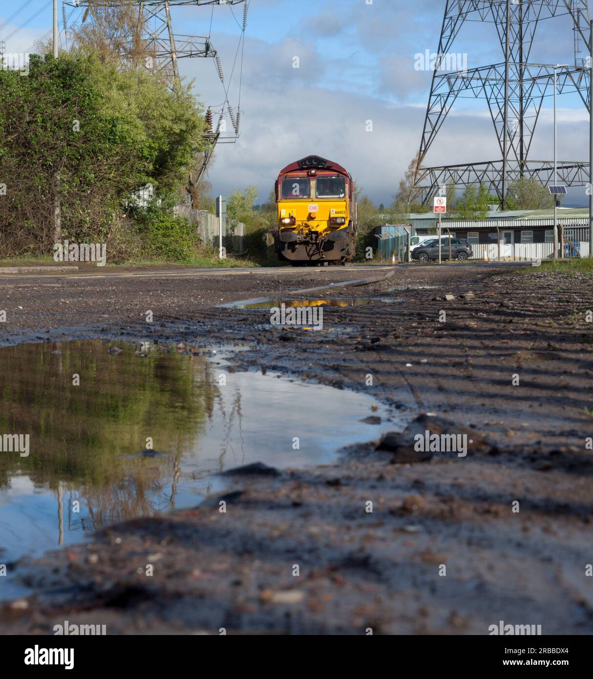 DB Cargo rail class 66 diesel locomotive 66053 hauling a freight train ...