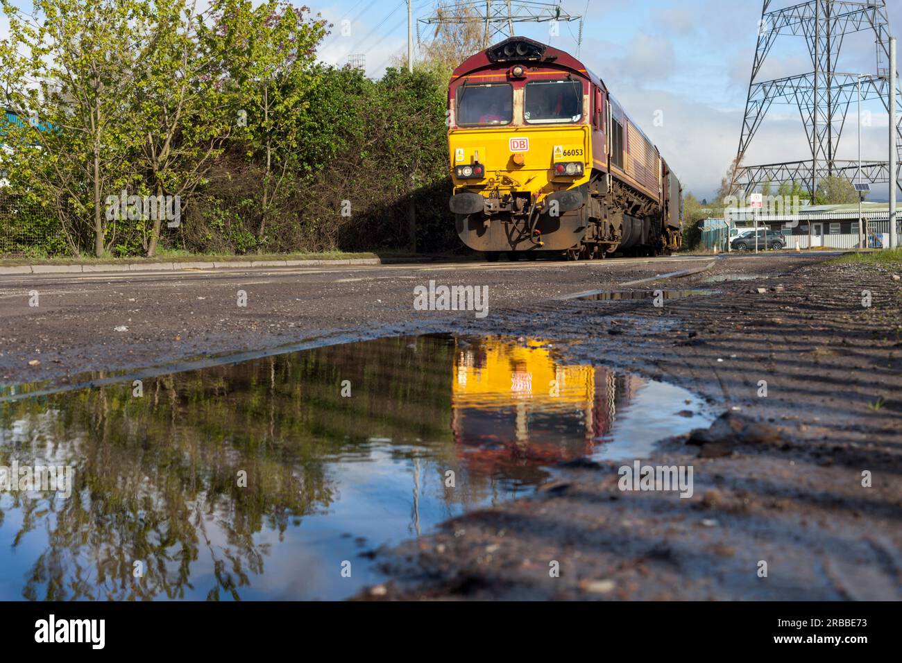 DB Cargo rail class 66 diesel locomotive 66053 hauling a freight train ...