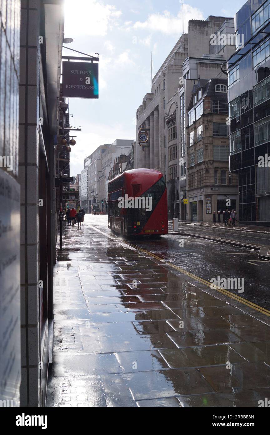 London, UK: passers-by and a double decker bus in Fleet Street, City of ...