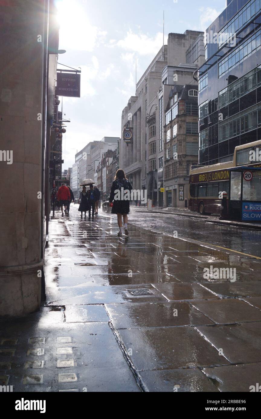 London, UK: people walking along the Fleet Street in the City of London ...