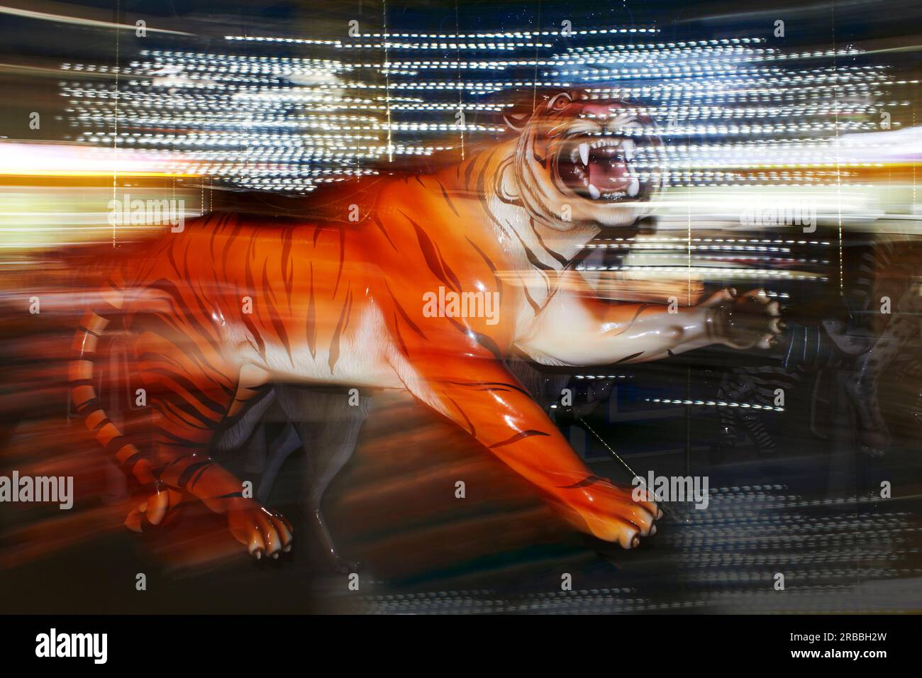 merry go round action shot Stock Photo - Alamy