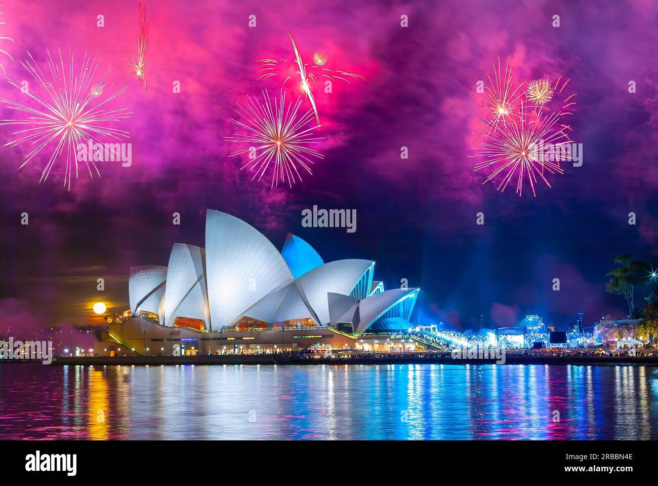 Large crowds gather to watch a fireworks show at Sydney Opera House in ...