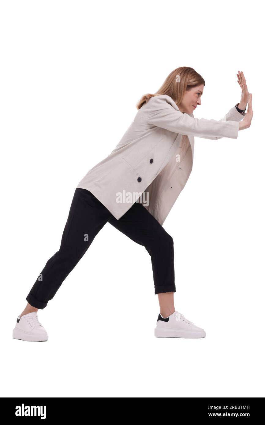 Posing pushing pose Cut Out Stock Images & Pictures - Alamy