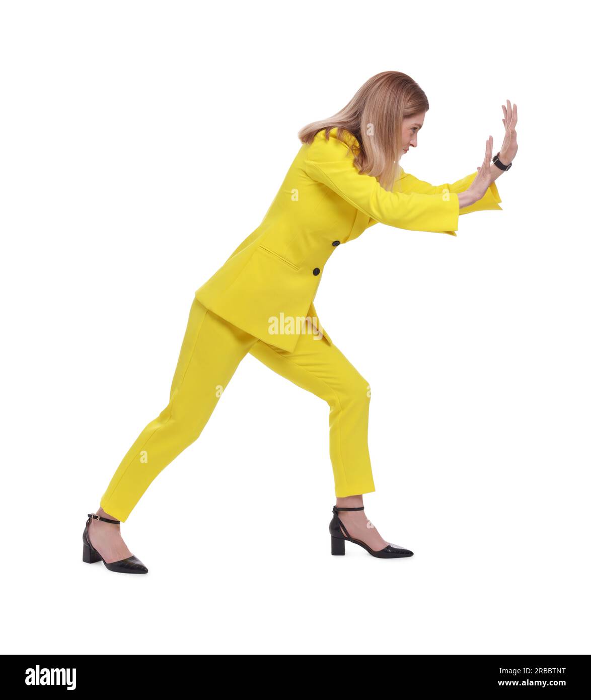 Attractive businesswoman pushing something hi-res stock photography and ...