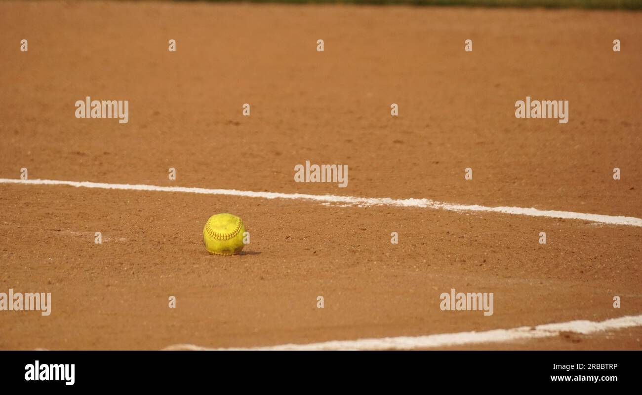 Softball in the pitcher's circle on a softball field Stock Photo - Alamy