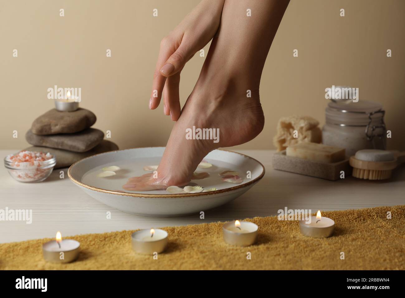 Dipping foot in water hi-res stock photography and images - Alamy