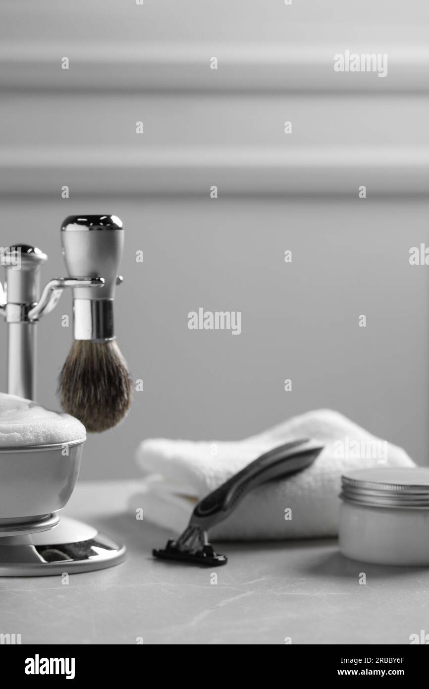 Set of men's shaving tools on grey table. Space for text Stock Photo ...