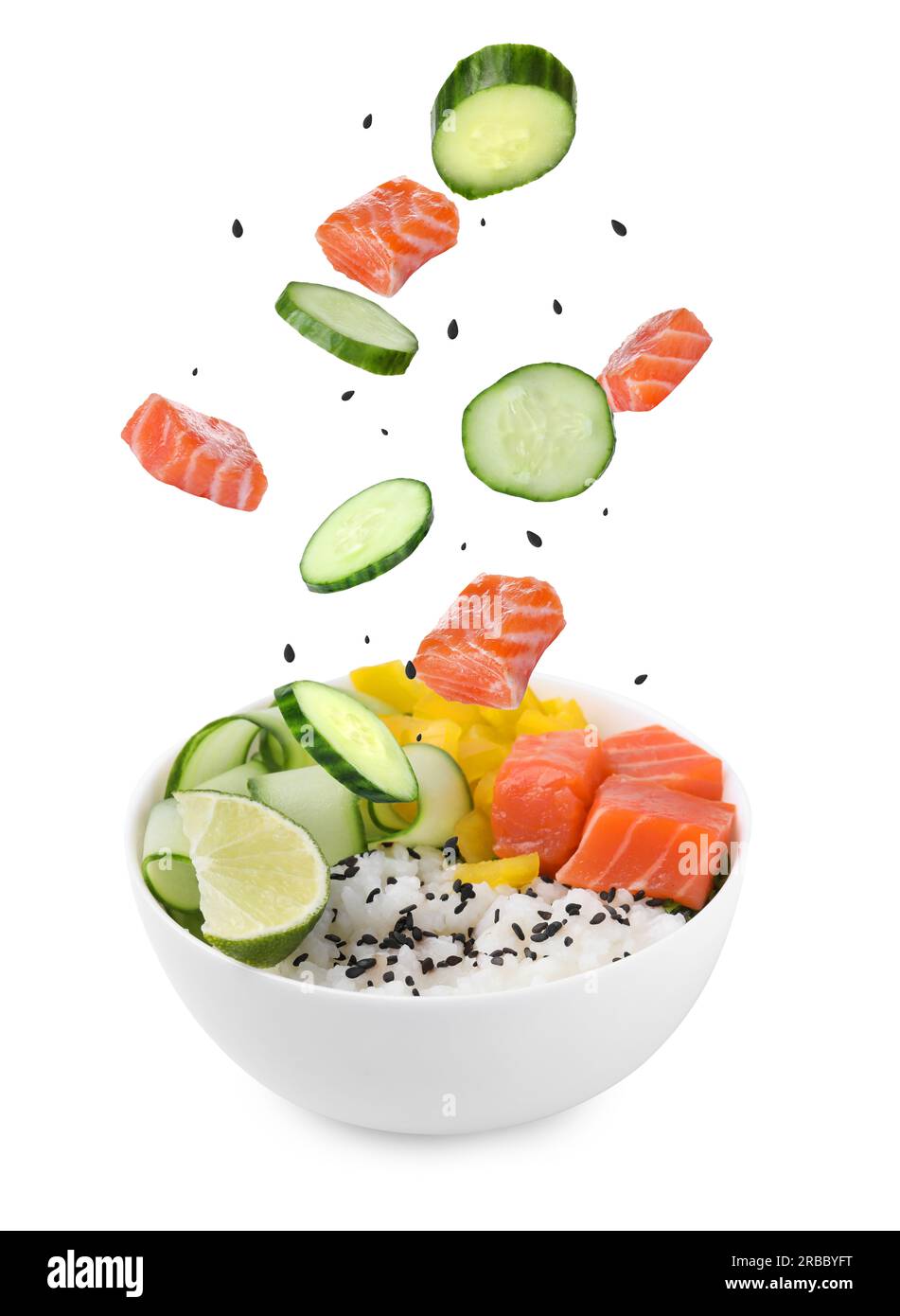 Poke recipe. Different ingredients falling into bowl on white ...