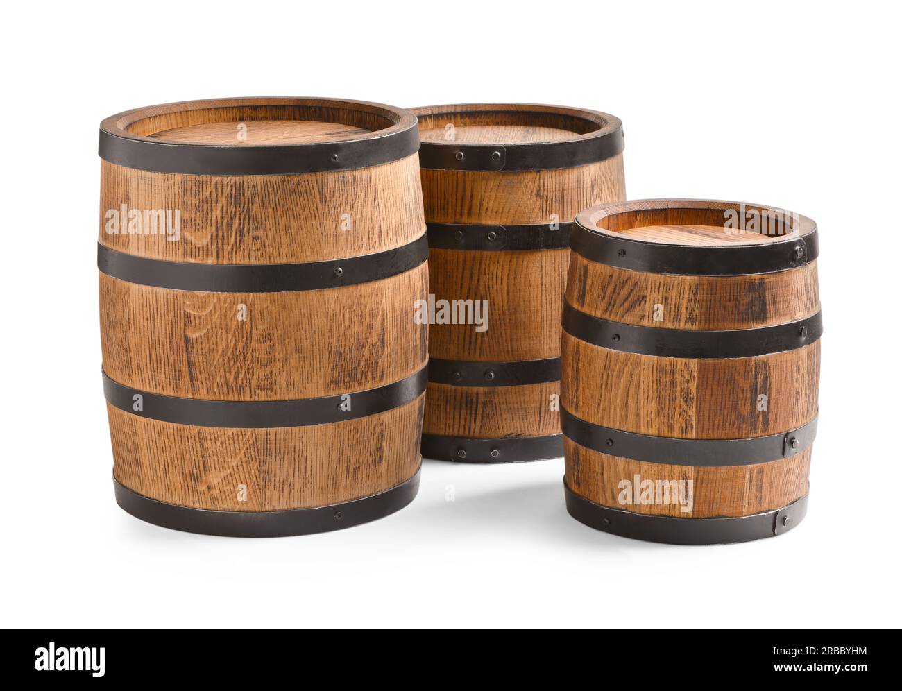 Three traditional wooden barrels on white background Stock Photo - Alamy