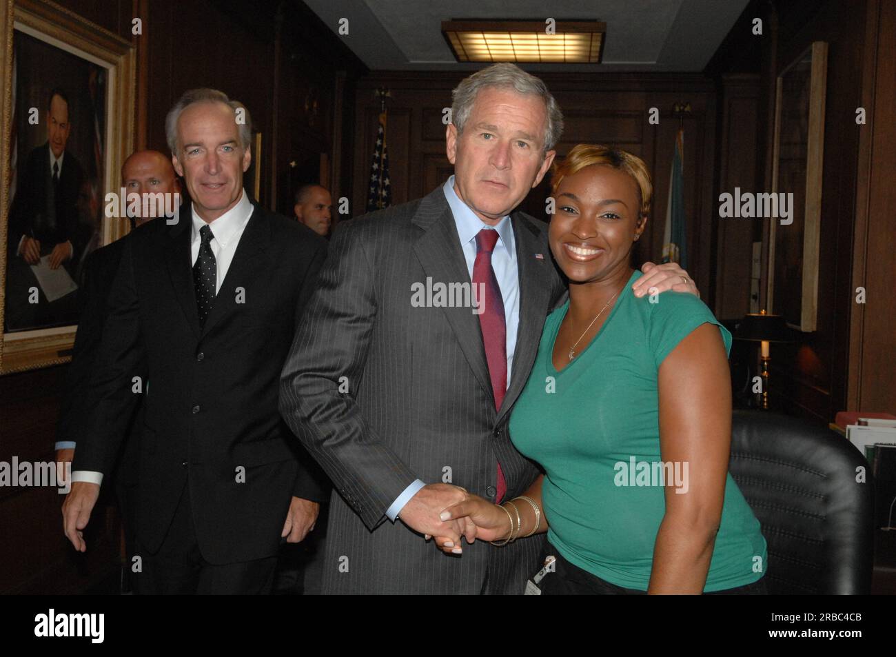President George W. Bush touring offices in Main Interior, meeting ...