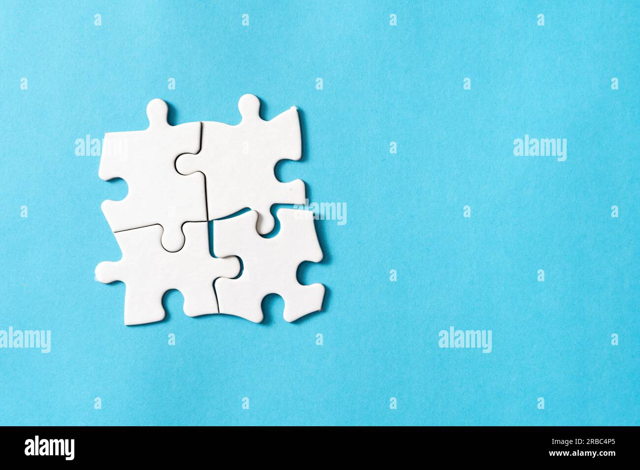 Four pieces of plain white jigsaw puzzle for business concept Stock ...