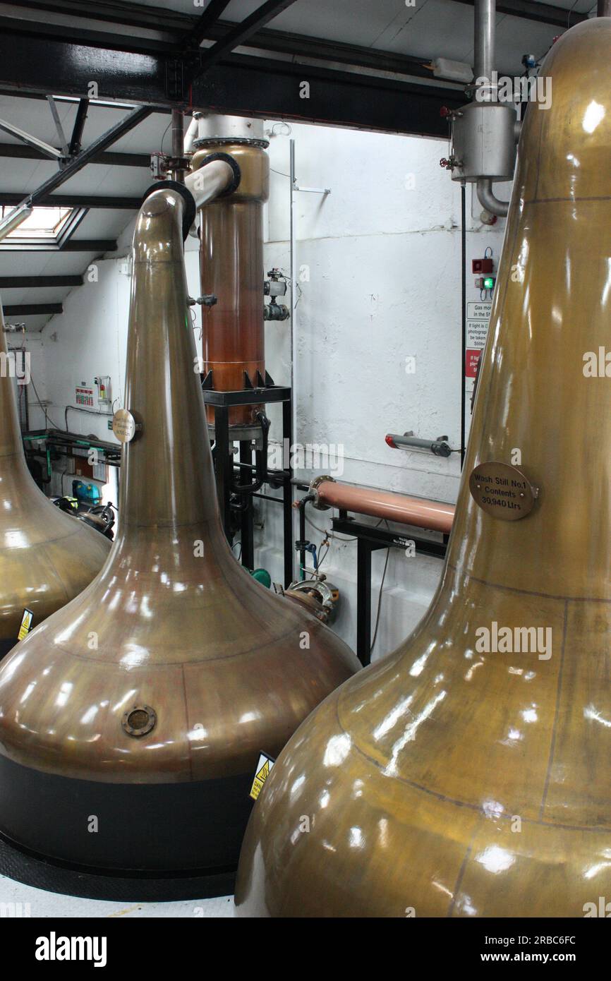 Whisky stills at the Bowmore Distillery, Islay Stock Photo - Alamy