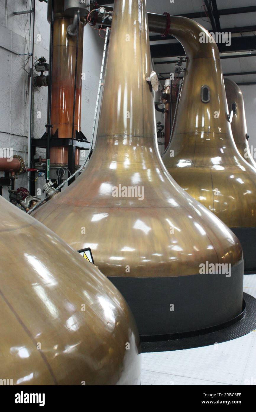 Whisky stills at the Bowmore Distillery, Islay Stock Photo - Alamy