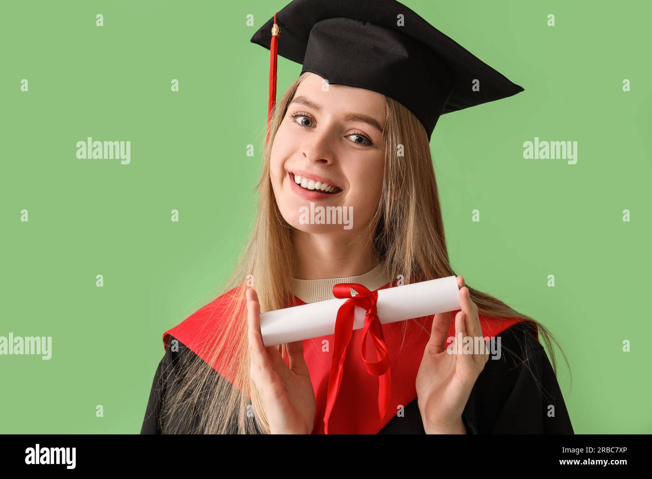 Female graduate student with diploma on green background, closeup Stock ...