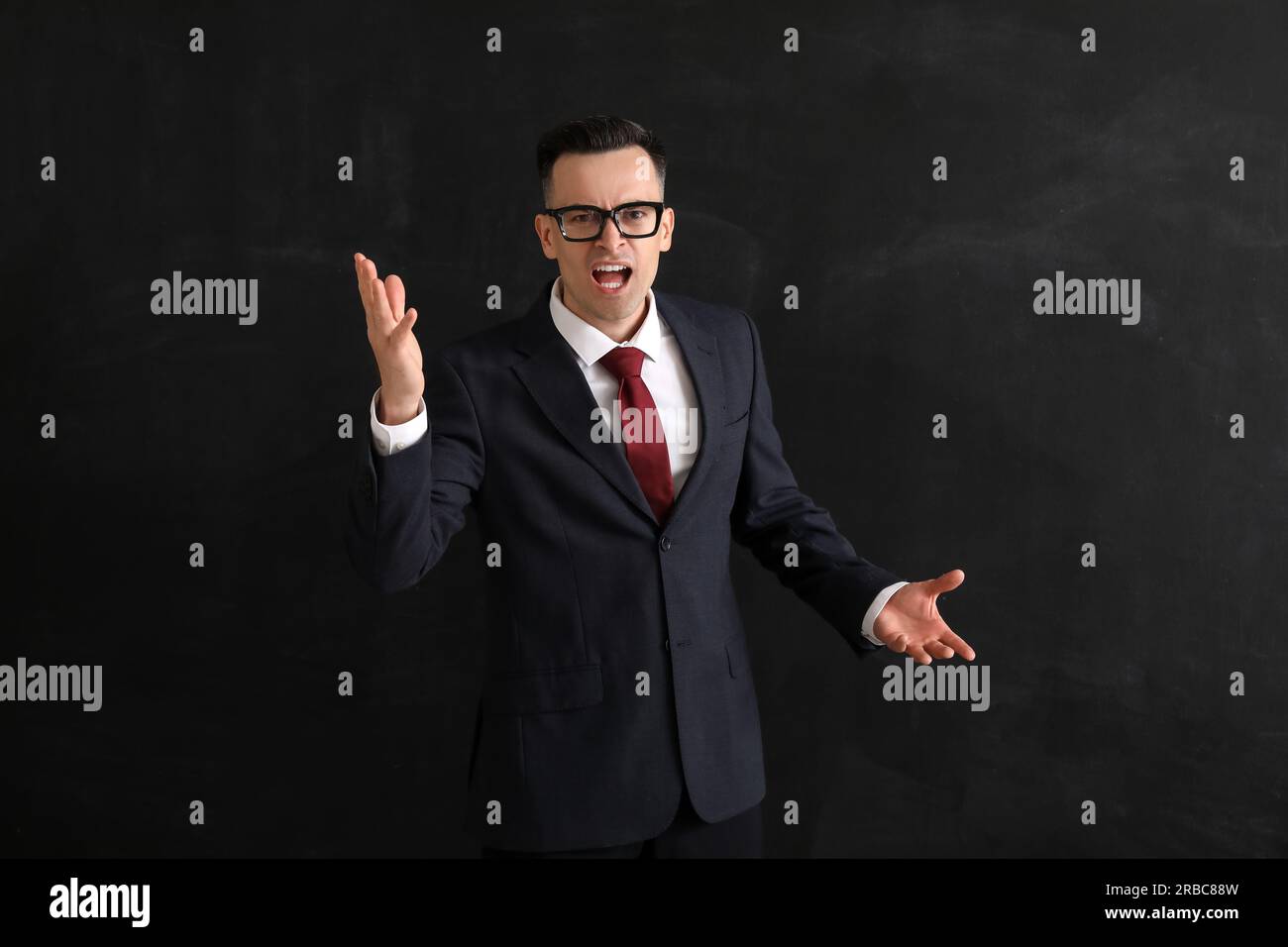Angry male teacher hi-res stock photography and images - Alamy