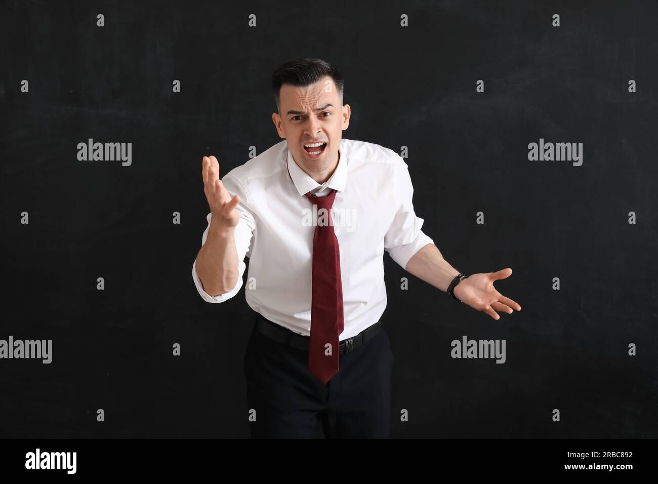 Angry male teacher hi-res stock photography and images - Alamy