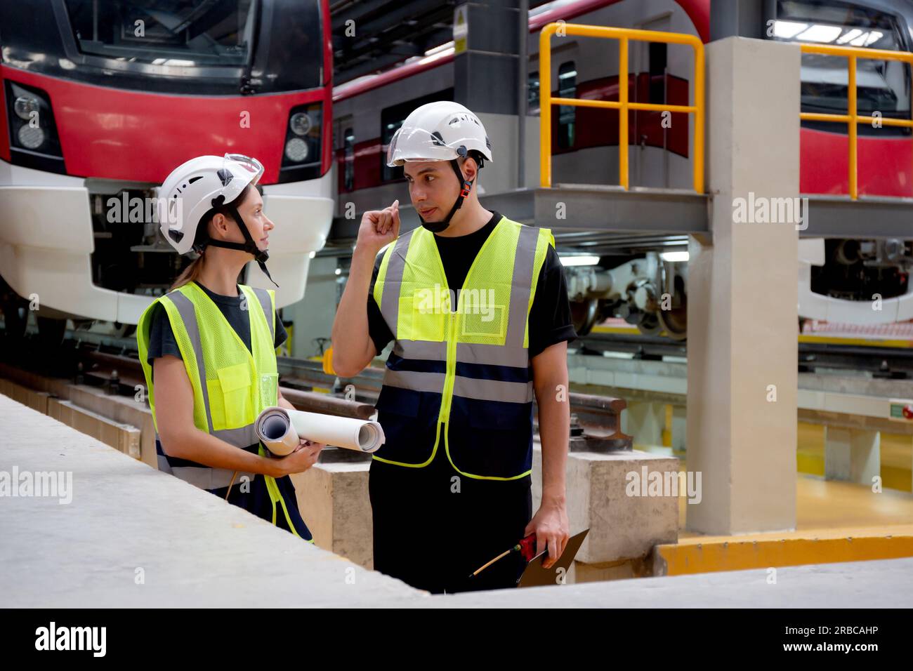 Young caucasian engineer man and woman meeting and checking electric ...